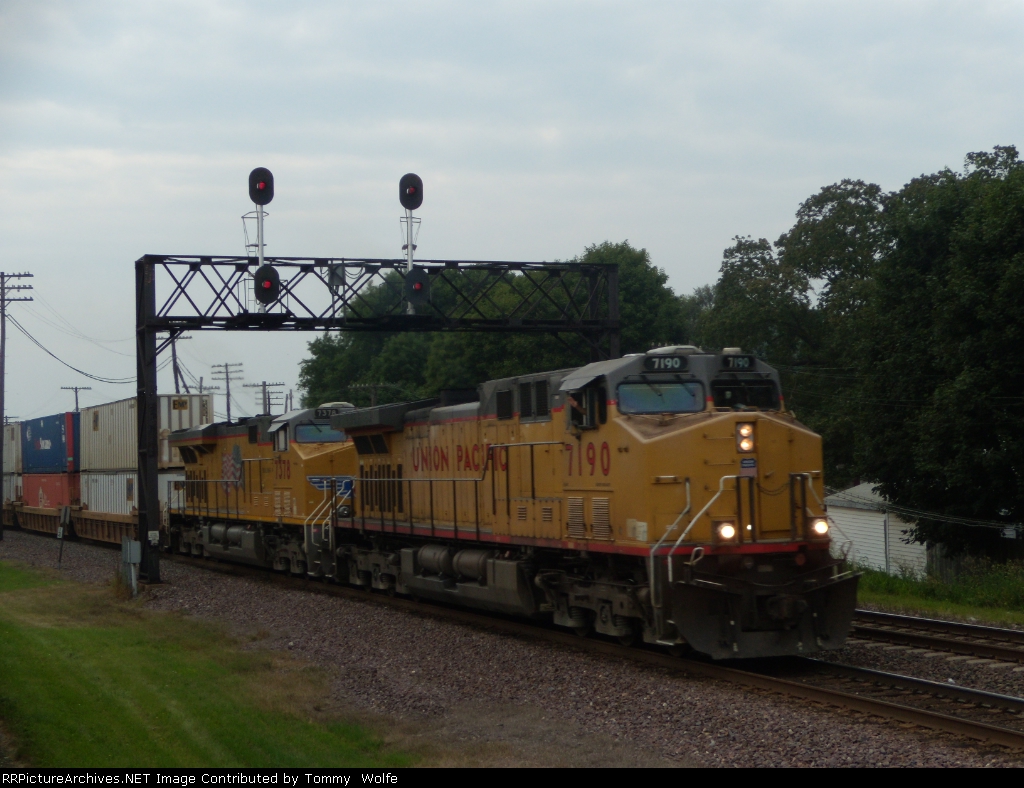 UP 7190 and UP 7378 lead a intermodal with a wave from the enginer